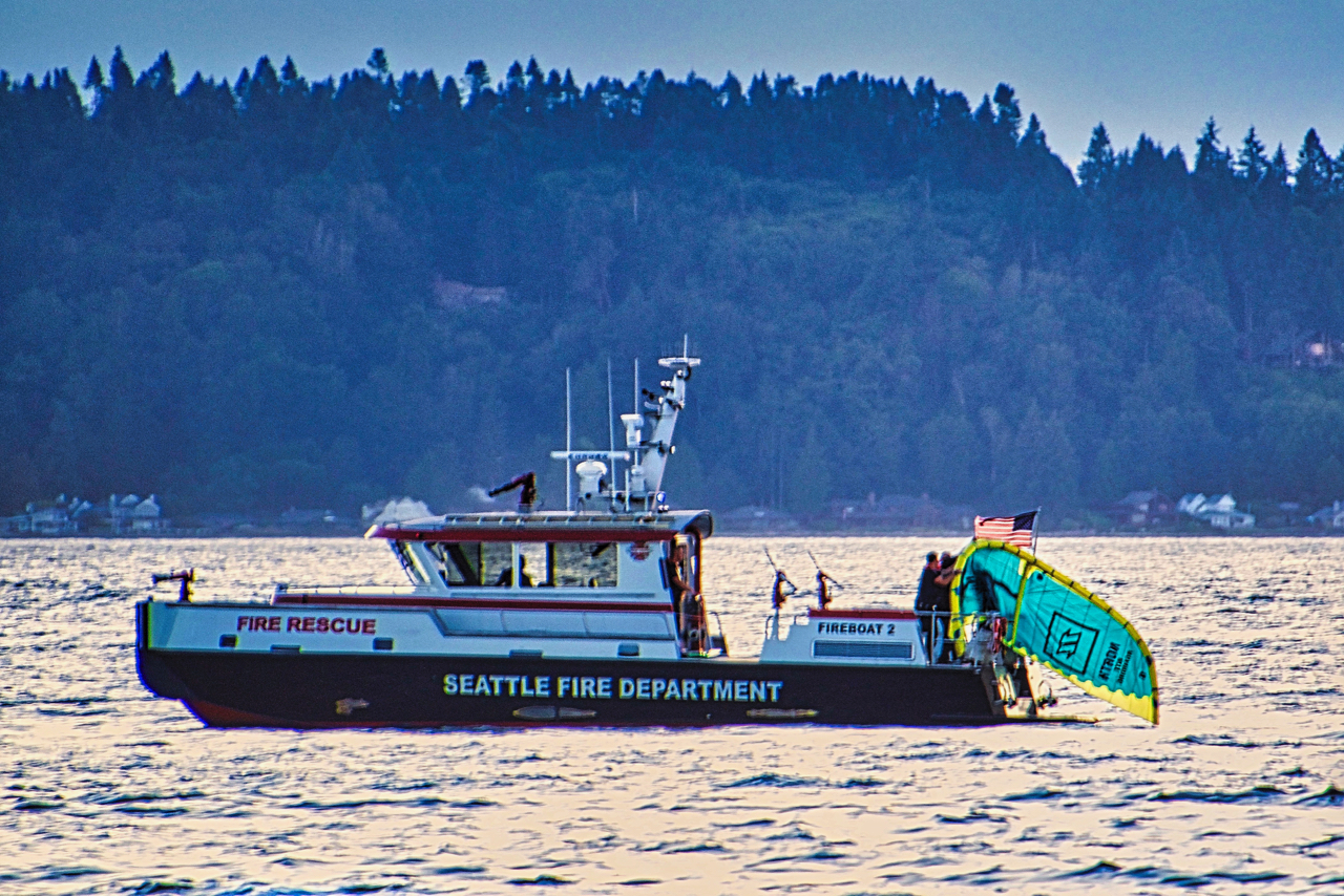 Windsurfer draws a lot of attention from onlookers and emergency crews ...